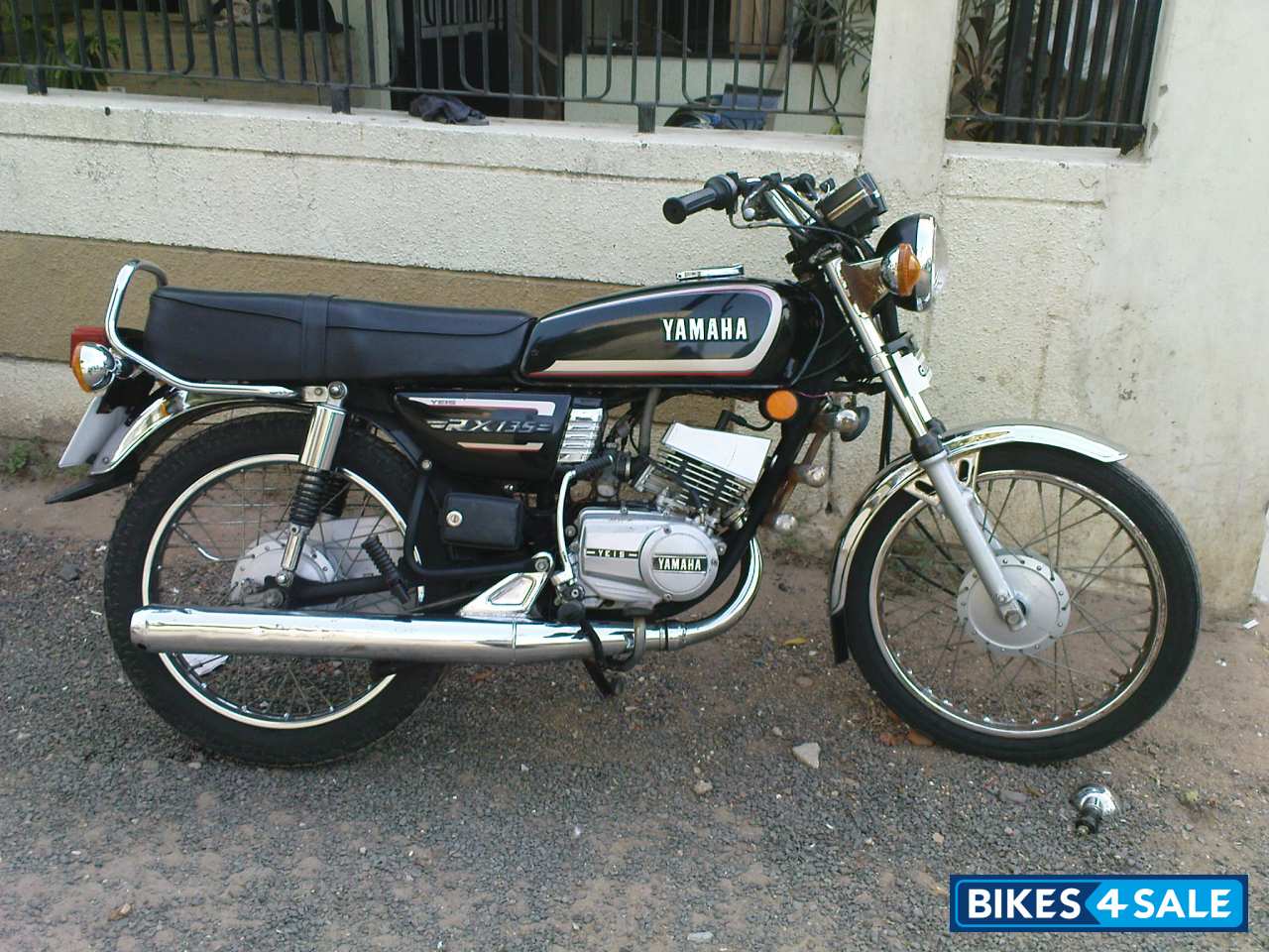 Used 2000 model Yamaha RX 135 for sale in Ahmedabad. ID 64279. Black colour - Bikes4Sale